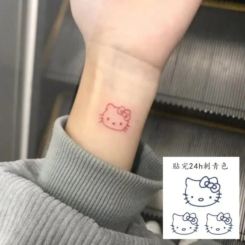 Hello Kitty Tattoos On Finger