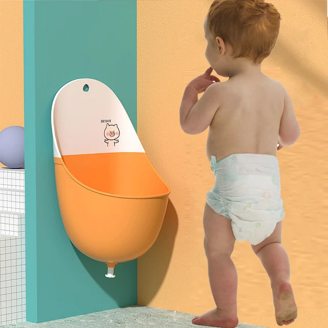 Little Boy Pees In Urinal