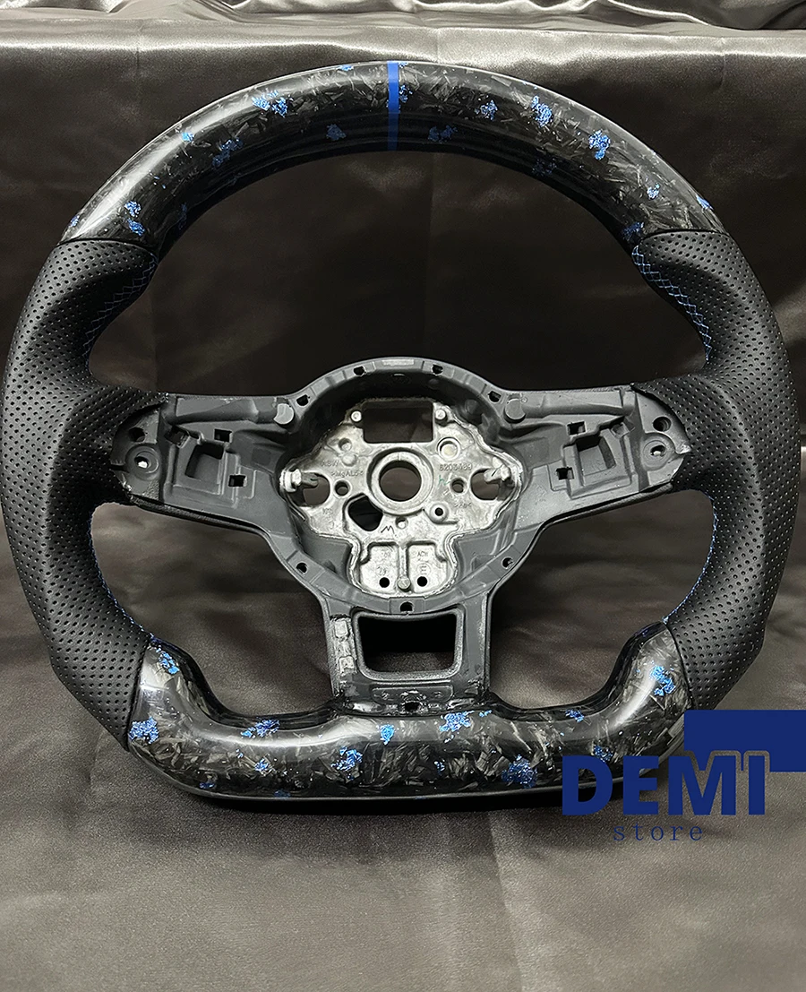 A-genuinely-forged-carbon-fibre-steering-wheel-with-blue-foil-and-blue ...