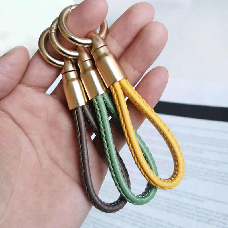 Fashion-High-Grade-Metal-Rotating-Bullet-Keychain-Men-Women-Weaving ...
