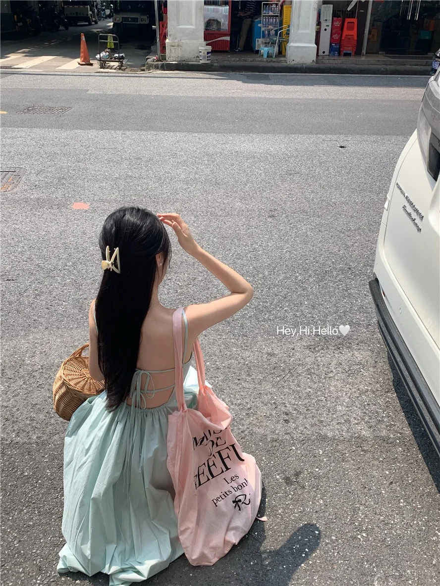 프렌치 스타일 화이트 슬링 드레스 여성 여름 섹시한 등이없는 레이스업 민소매 A 라인 스커트 랩 어라운드 해변 휴가 스커트