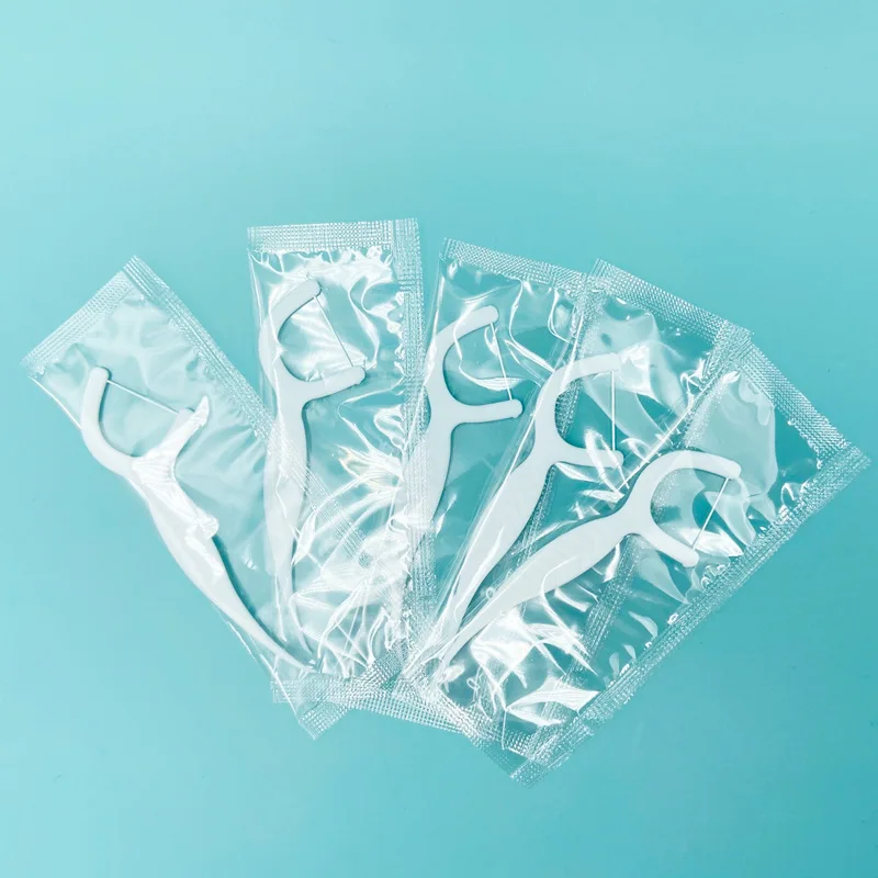 White Individually Packaged Dental Floss Sticks Oral Hygiene Cleaning ...