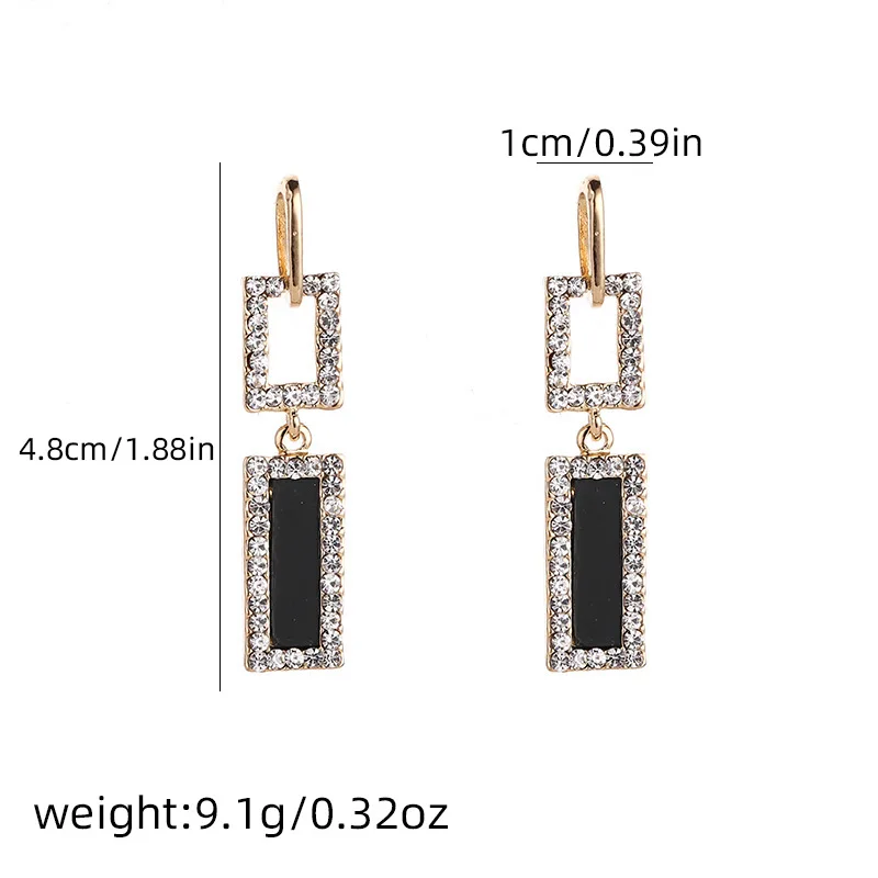 Vintage-Compass-Shaped-Earrings-with-Classic-Black-Diamonds-on-a-Golden ...