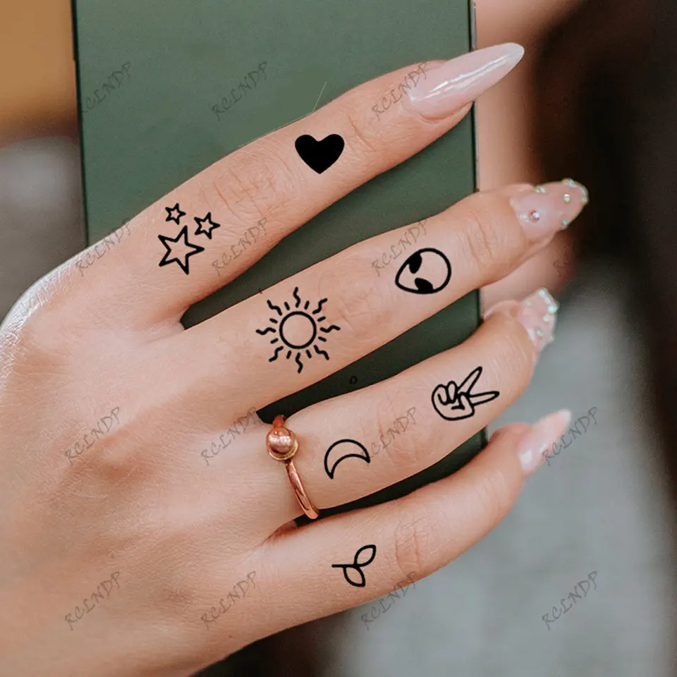Cute Alien Finger Tattoo