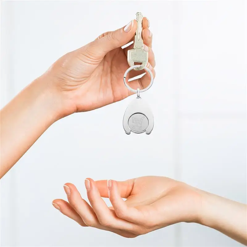 Hand And Key Change Holder