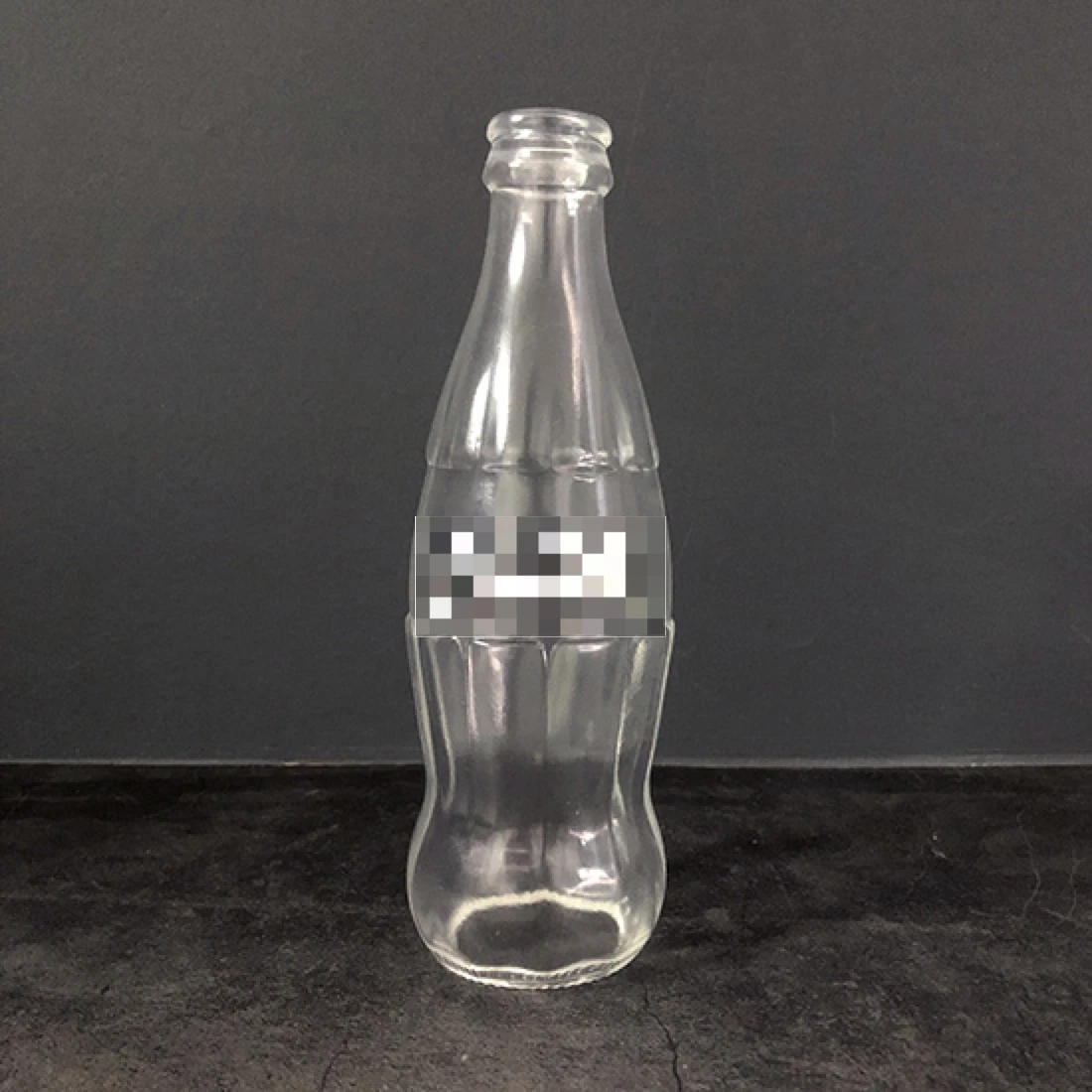 Empty Glass Coke Bottle