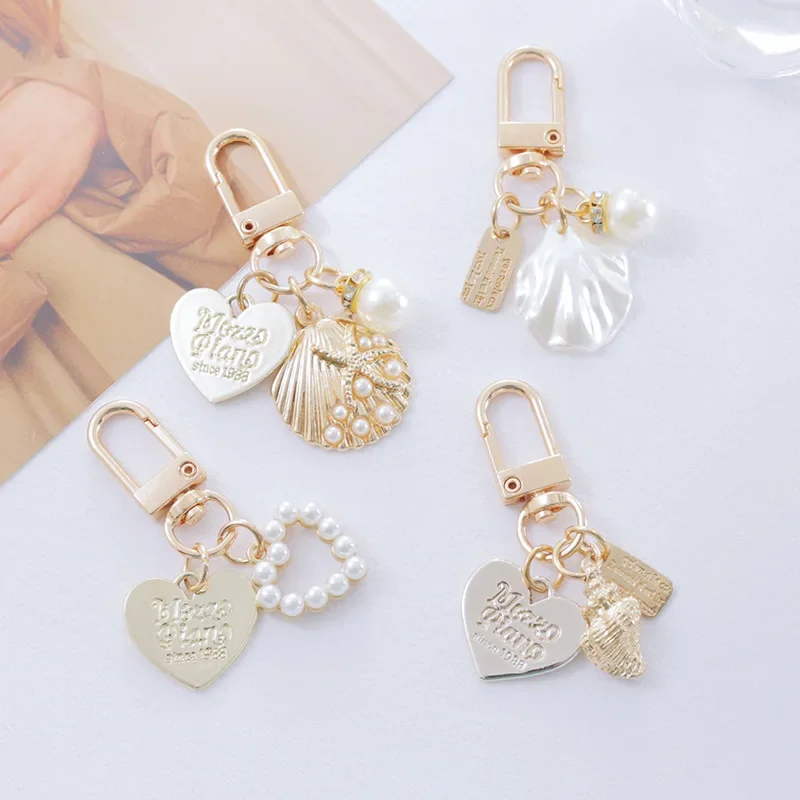 Metal-keychain-cute-shell-key-pendant-ins-bag-pendant.jpg