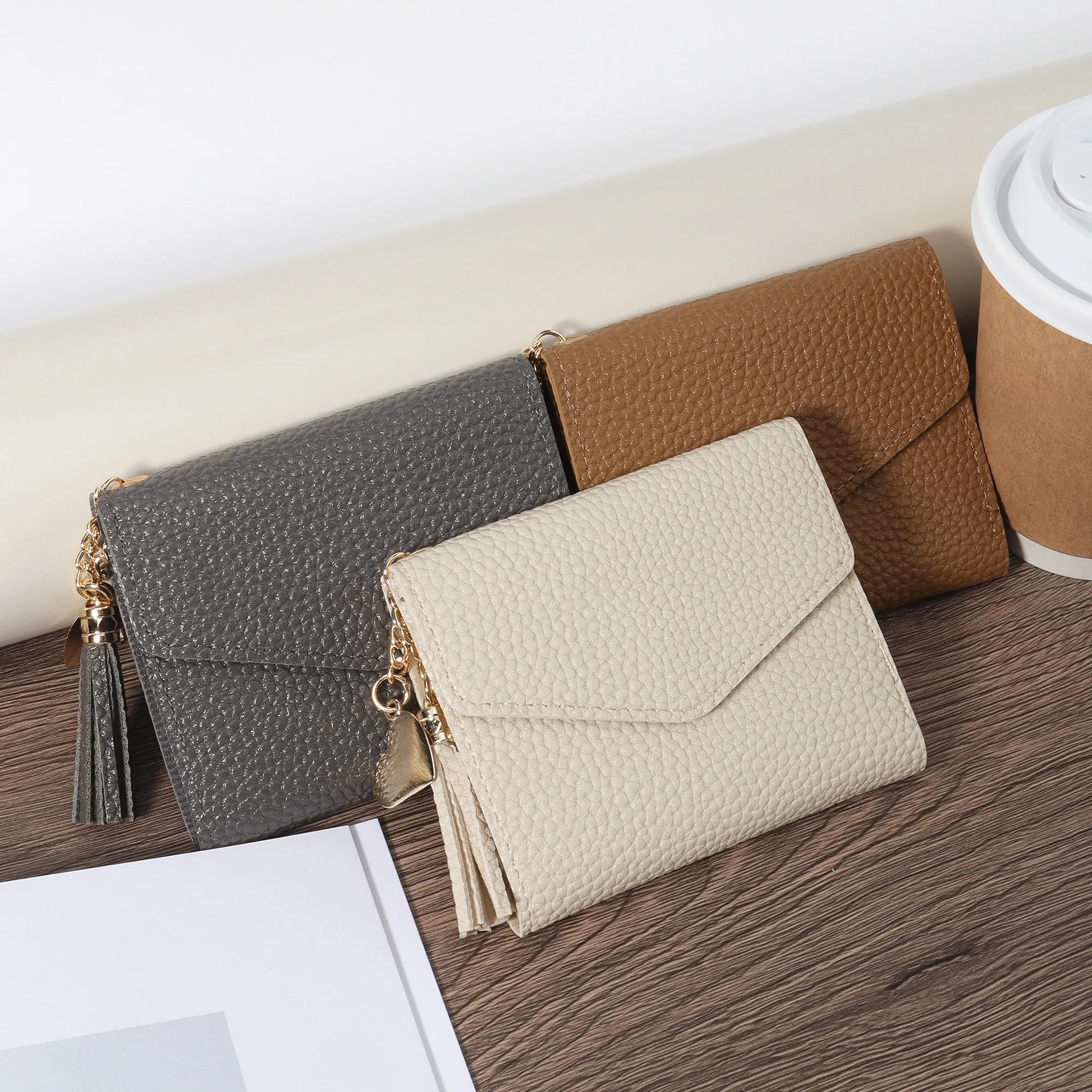 Fashionable-metal-heart-shaped-and-tassel-decorated-small-wallet-coin ...