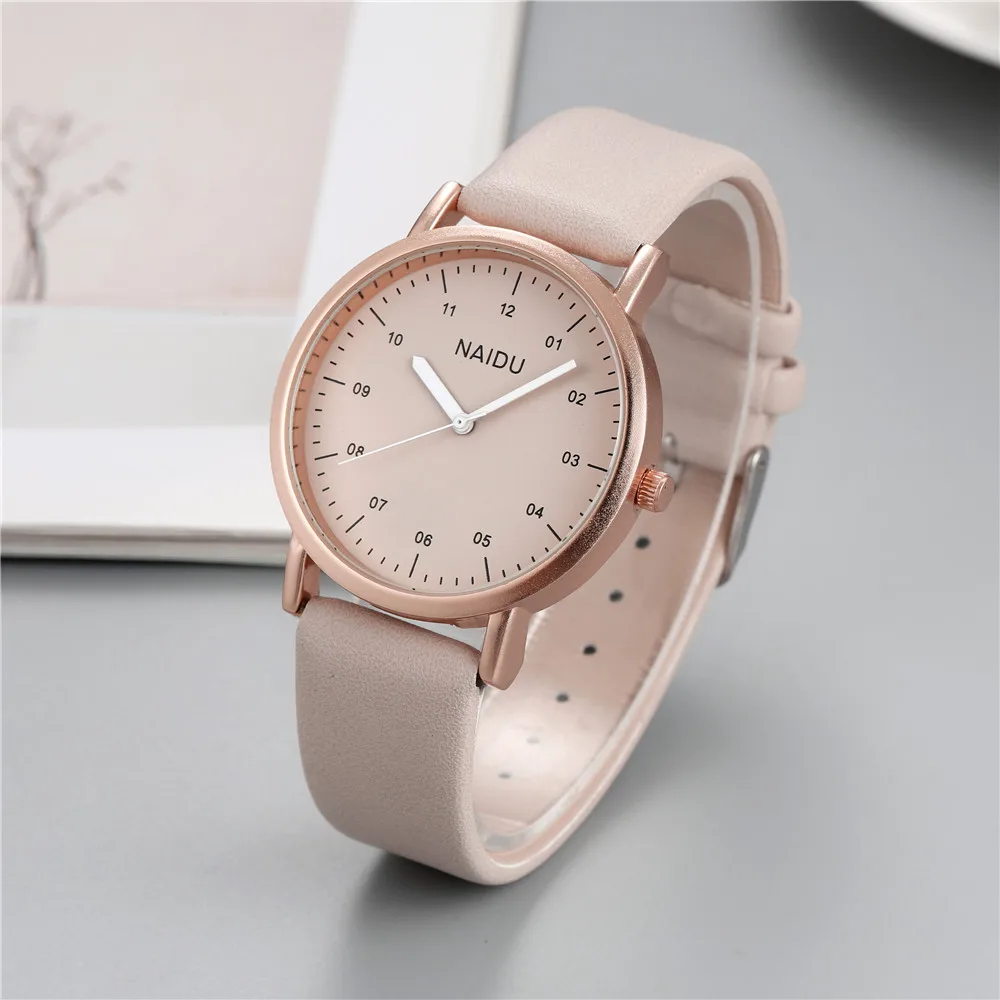 elegant-fashion-round-dial-women-casual-leather-watch.jpg