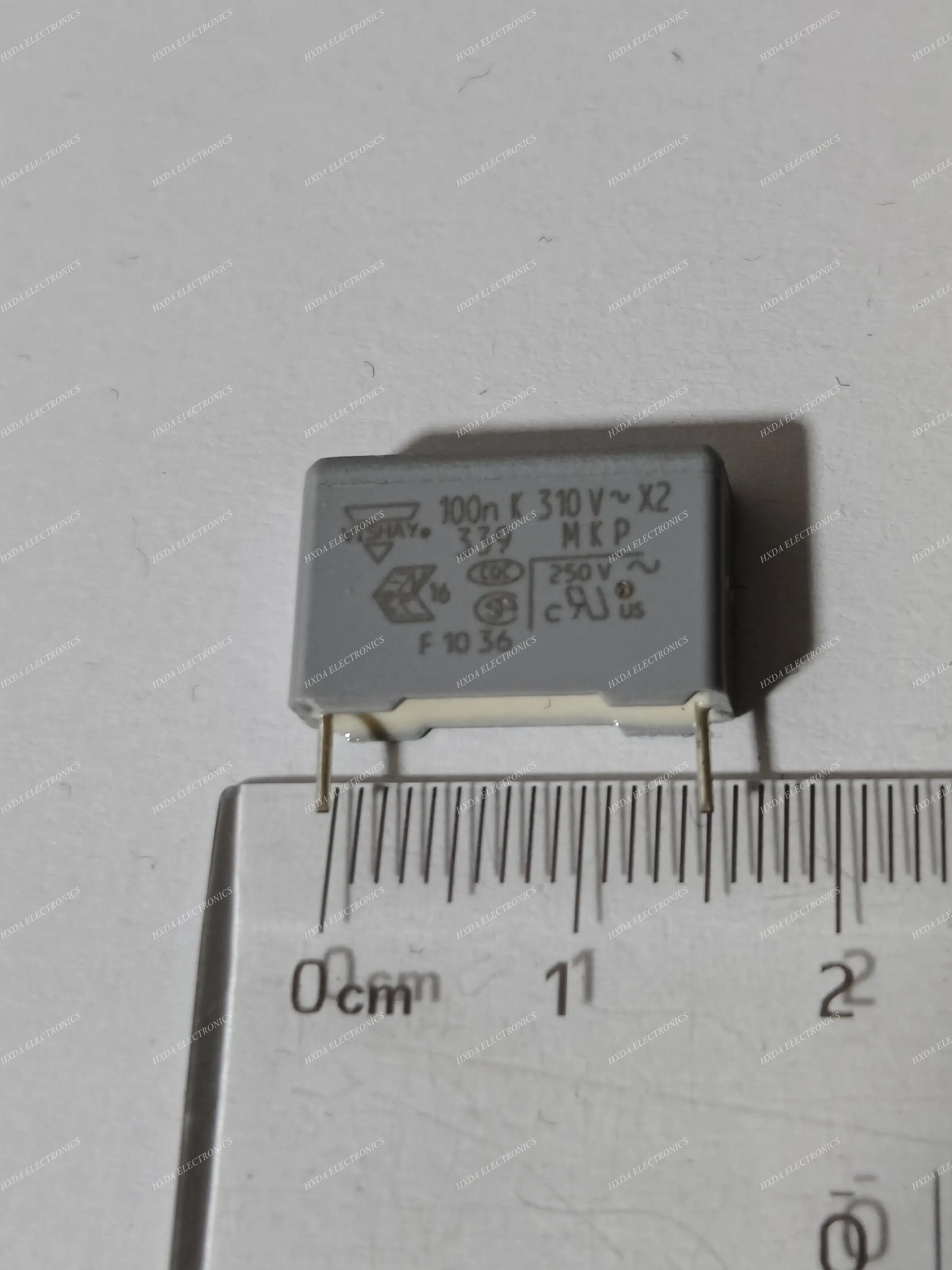 Capacitor-100n-330n-k-310v-x2-pcx2-339-mkp-mkp339-0-1-uf-0-33-uf.jpg