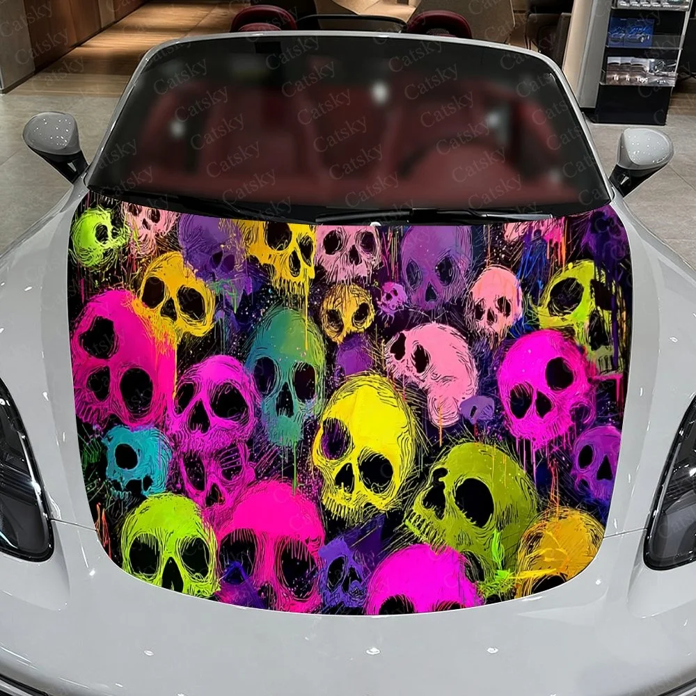 Vibrant neon skulls splash across hood, bold graffiti style with ...