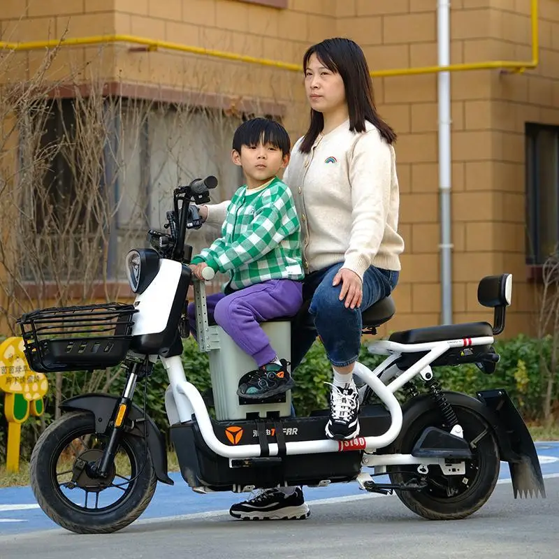 Electric scooter with child seat store