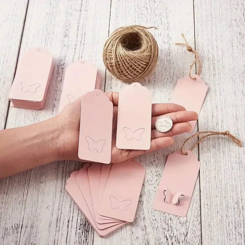100-pink-tags-with-wavy-top-edge-and-butterfly-wings-hollowed-out-hang ...