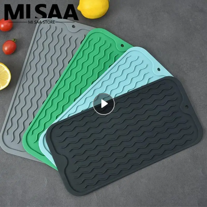 Pad-Tableware-Insulation-Multi-functional-Silicone-Placemat-Storage-Mat.jpg