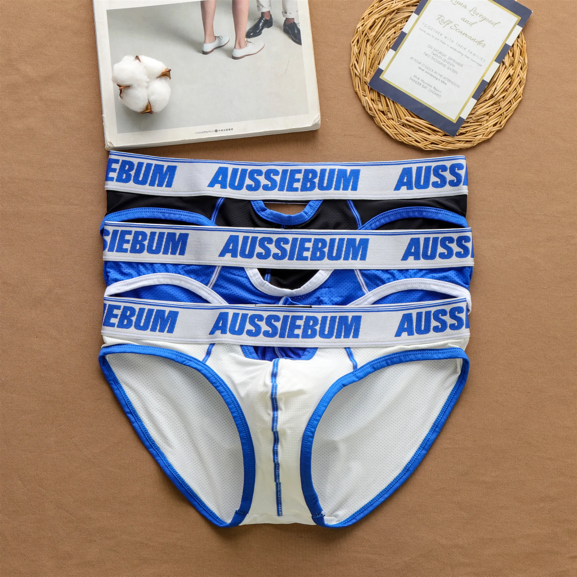 Men's sexy front and back small hollow panties tide comfortable ...