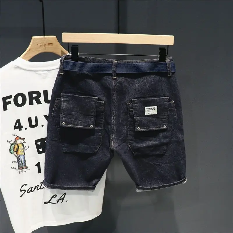 Moda confortável casual na altura do joelho denim preto designer shorts ...