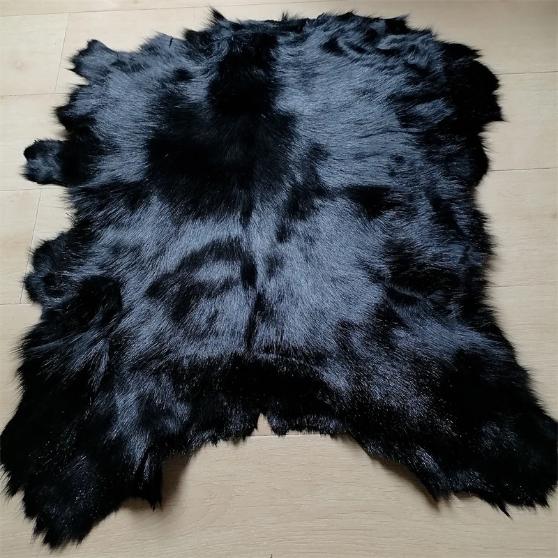 A Whole Black Sheepskin Mat. Wool Sofa Cushions. A One-Piece Fur Mat ...