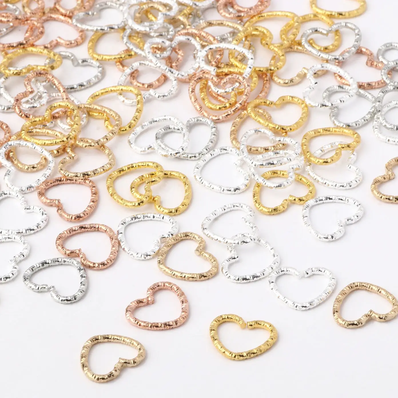 50pcs-14x12mm-Gold-Silver-Color-Love-Heart-Jump-Rings-Twisted-Open ...