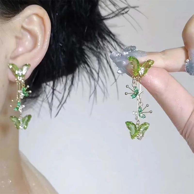 Nuovi-orecchini-a-farfalla-con-zirconi-verdi-alla-moda-per-le-donne-orecchini-lunghi-con-nappe.jpg