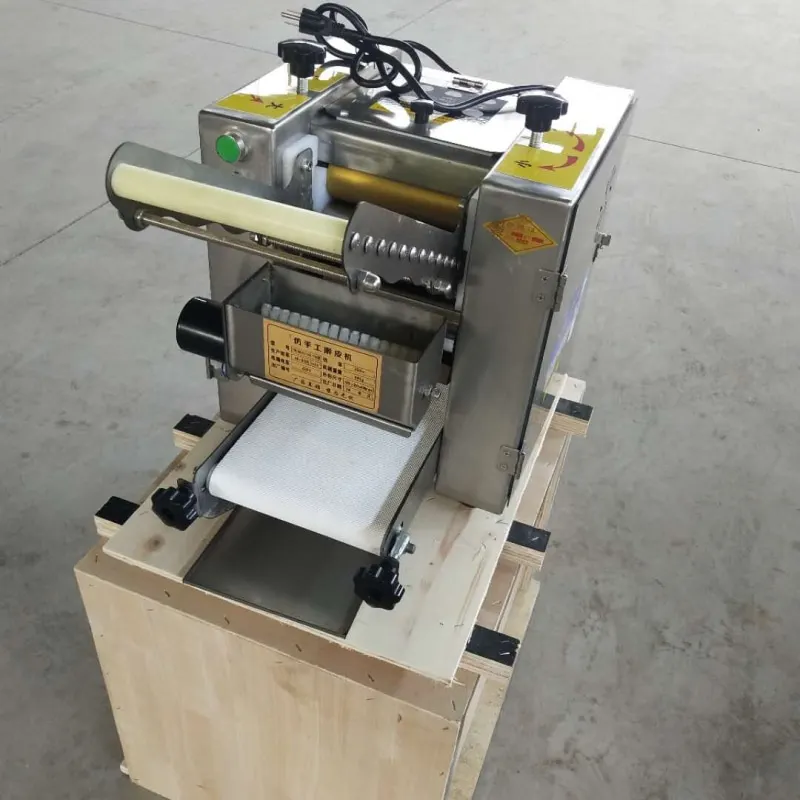 Máquina de fazer a massa do envoltório da pele da samosa empanada do ...