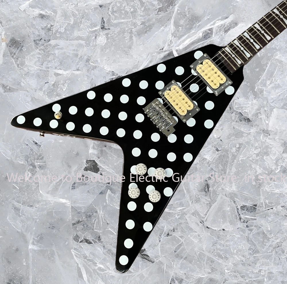 Customized Flying V electric guitar by Randy Rhoads - Polka in black ...