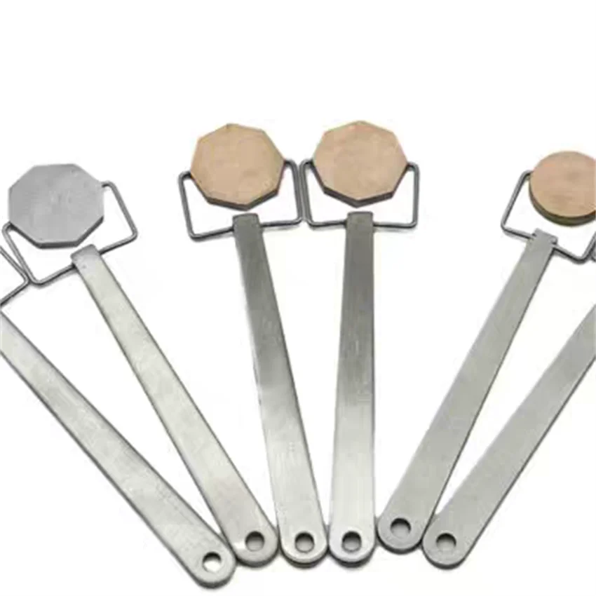 Octagonal test blocks for magnetic field indicator magnetic particle ...