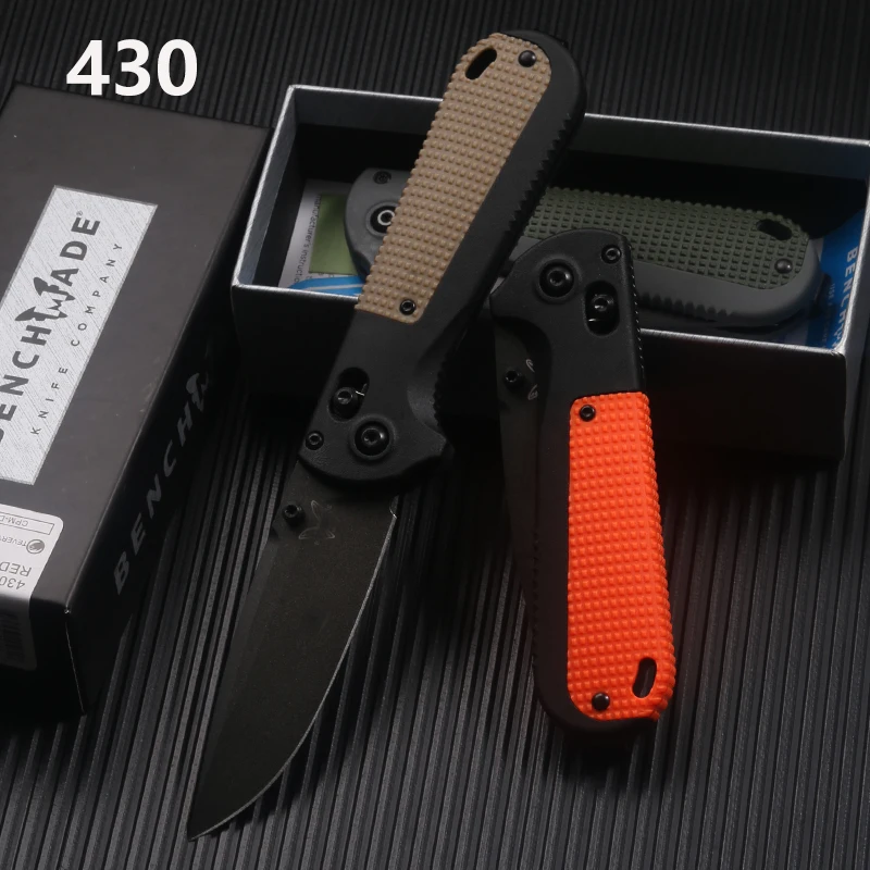 The-430-handle-is-made-of-polymer-material-and-the-BM-knife-is ...