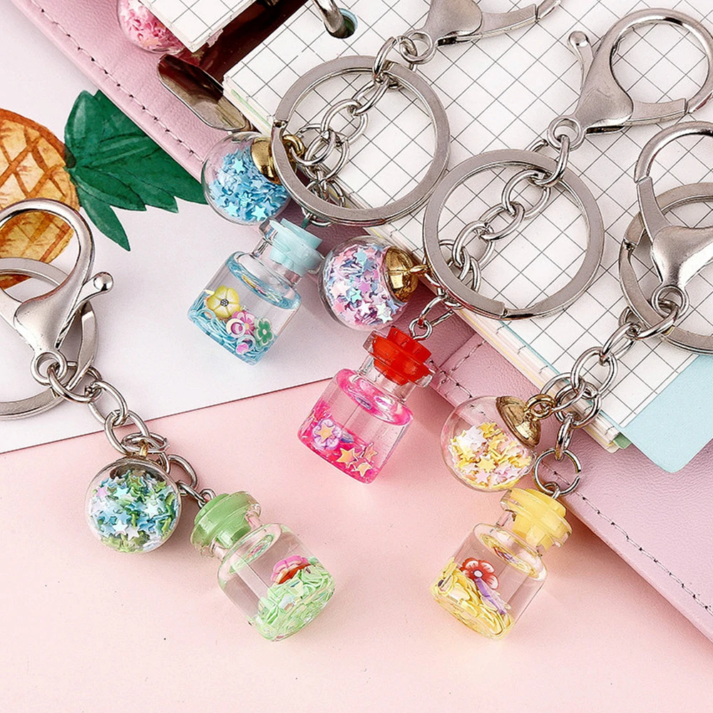 New-Trendy-Cute-Flower-Quicksand-Bottle-Keychain-Creative-Keyring ...