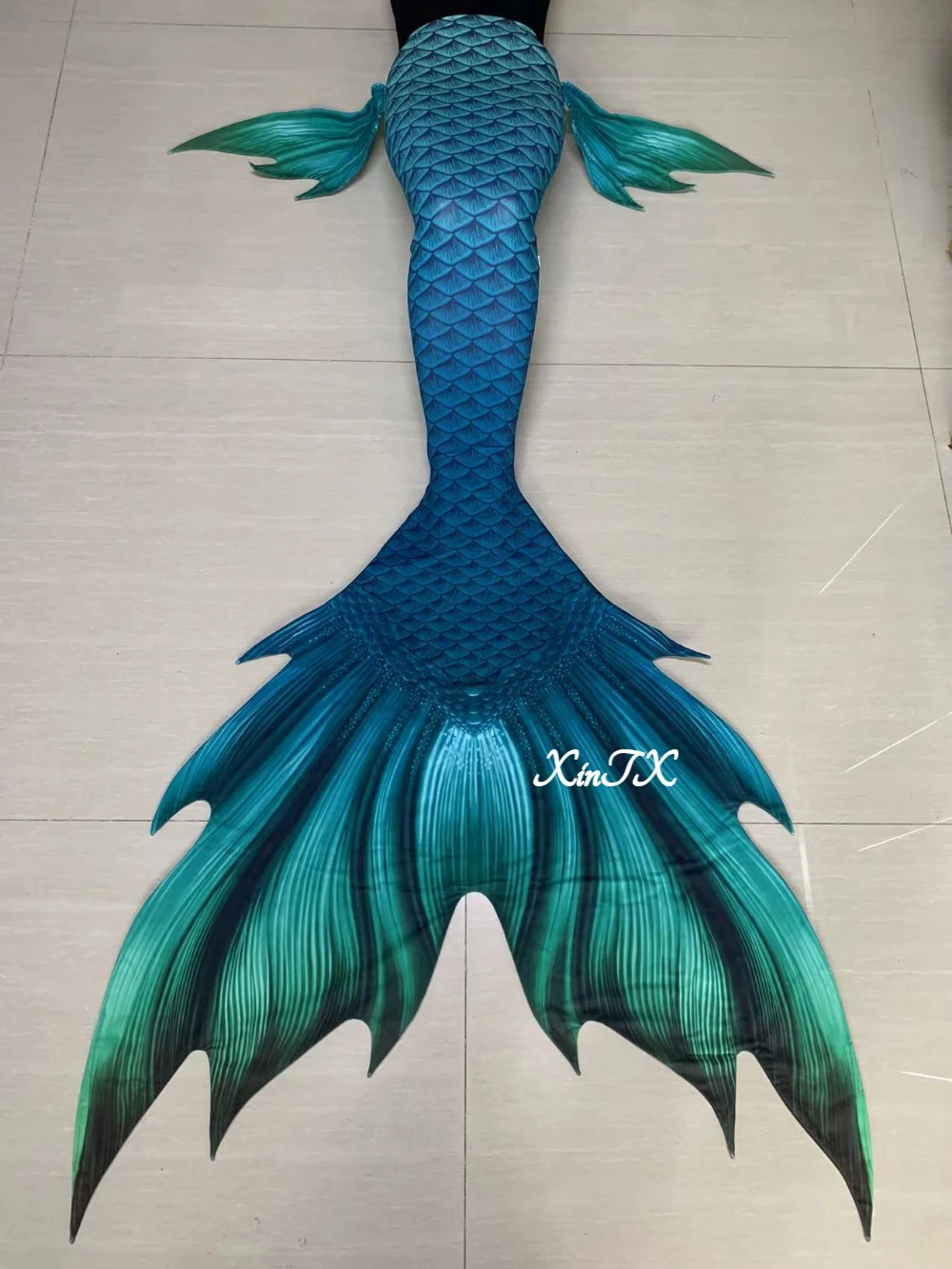 Blue And Green Mermaid Tails