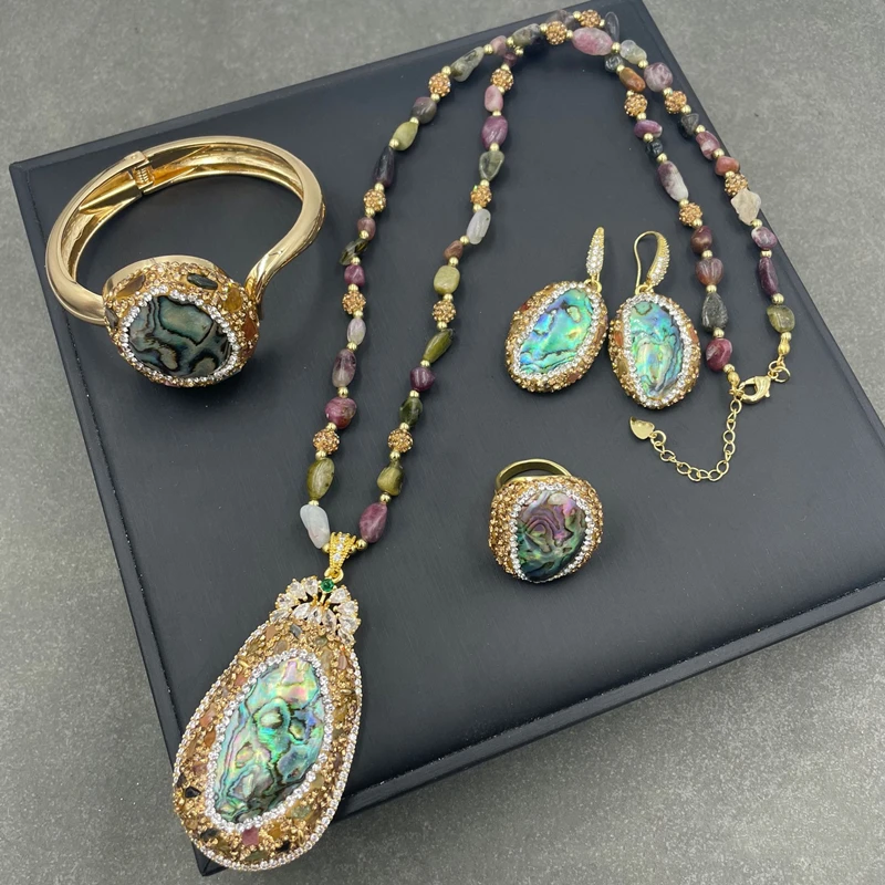 Natural-deep-sea-pearl-Mabei-inset-with-amethyst-four-piece-set-of-high ...