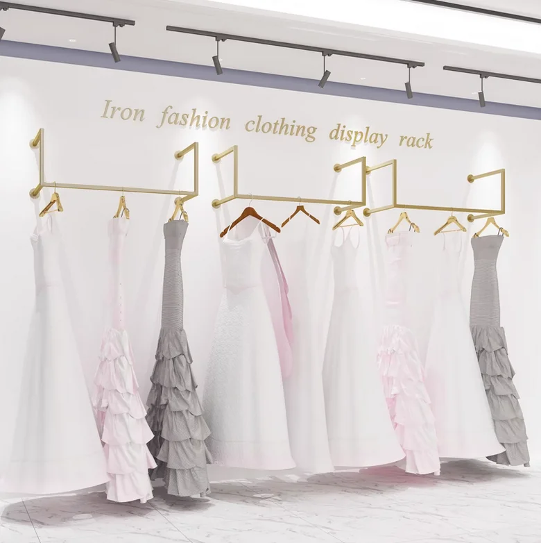 Wedding-store-hanger-display-rack-with-iron-and-gold-wall-hanging ...