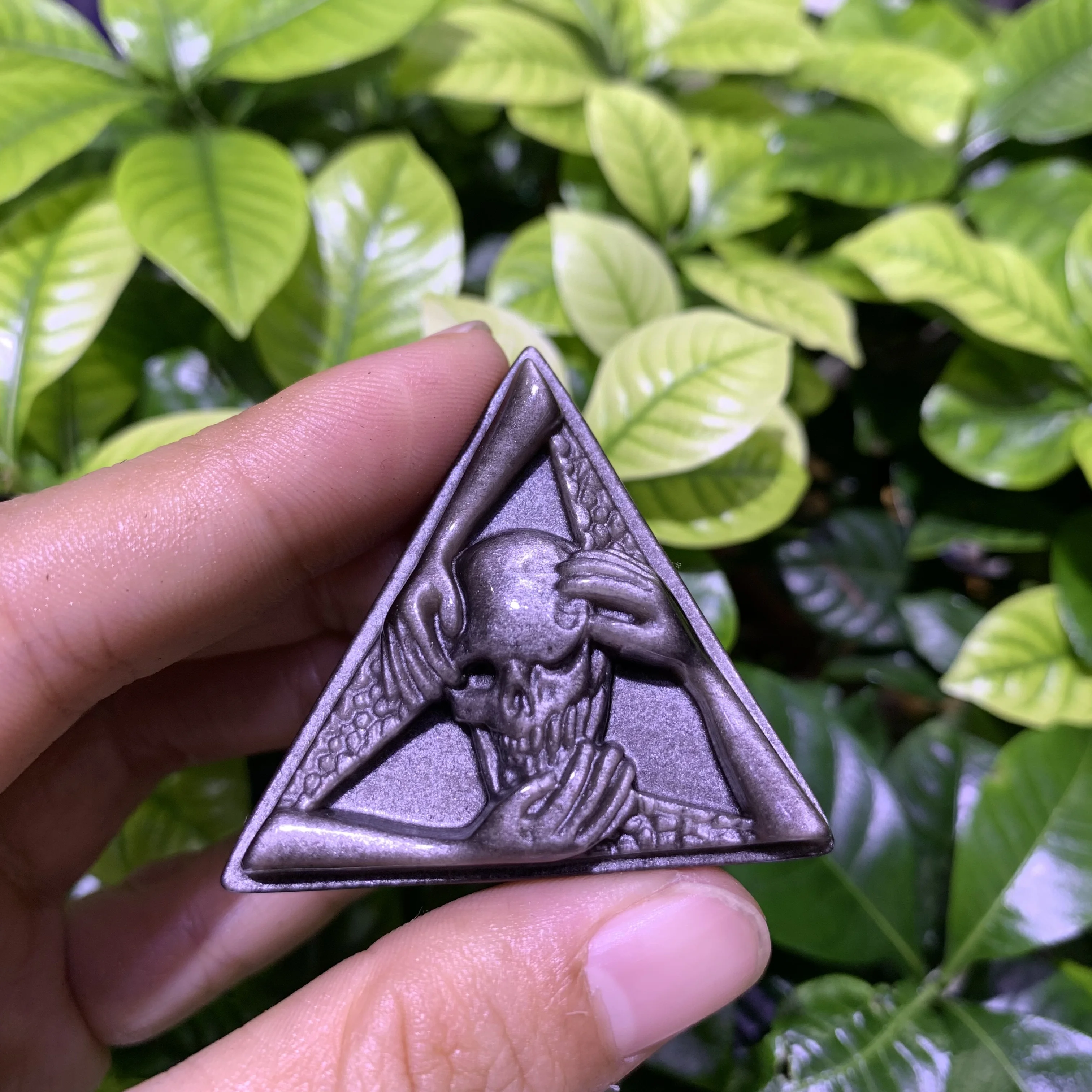 Natural silver obsidian carving triangular with skull design ...
