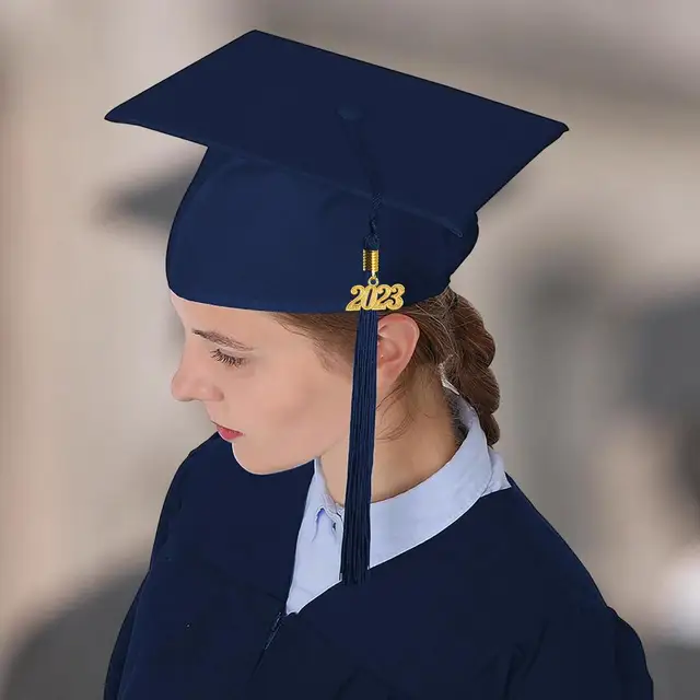 Blue Graduation Cap And Gown
