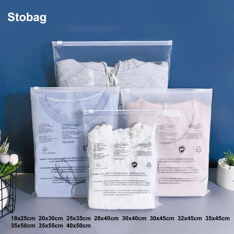 StoBag 50pcs Transparent Zipper Bags with Worning Words Clothes Packaging Pouch Clear Plastic ...