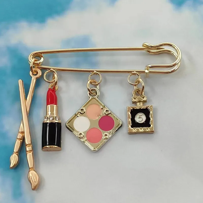 Metal-enamel-cosmetics-brooch-eye-shadow-lipstick-perfume-key-ring ...