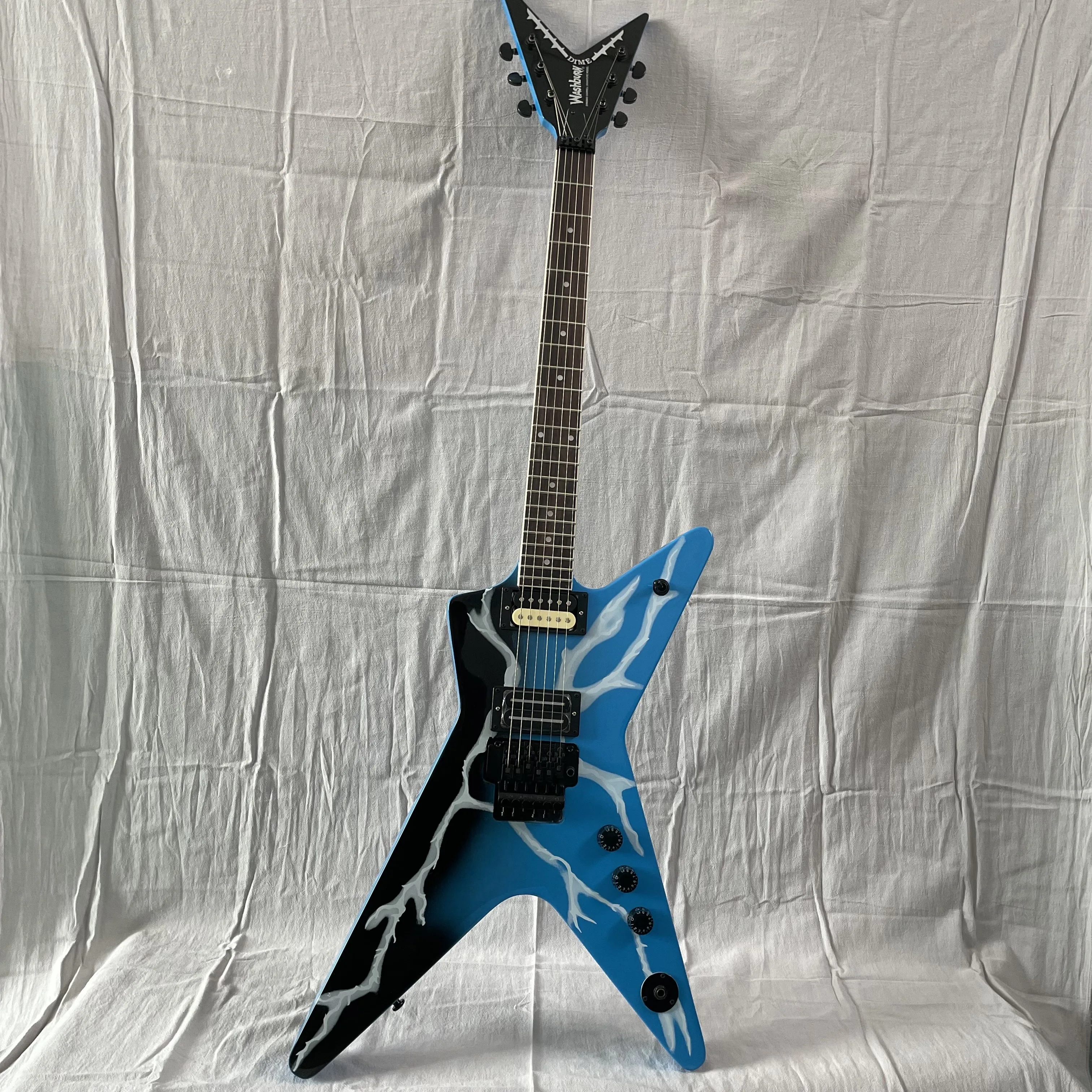 Custom-Dimebag-Darrel-the-Dean-ML-shaped-shaped-electric-guitar-lightning-veneer.jpg
