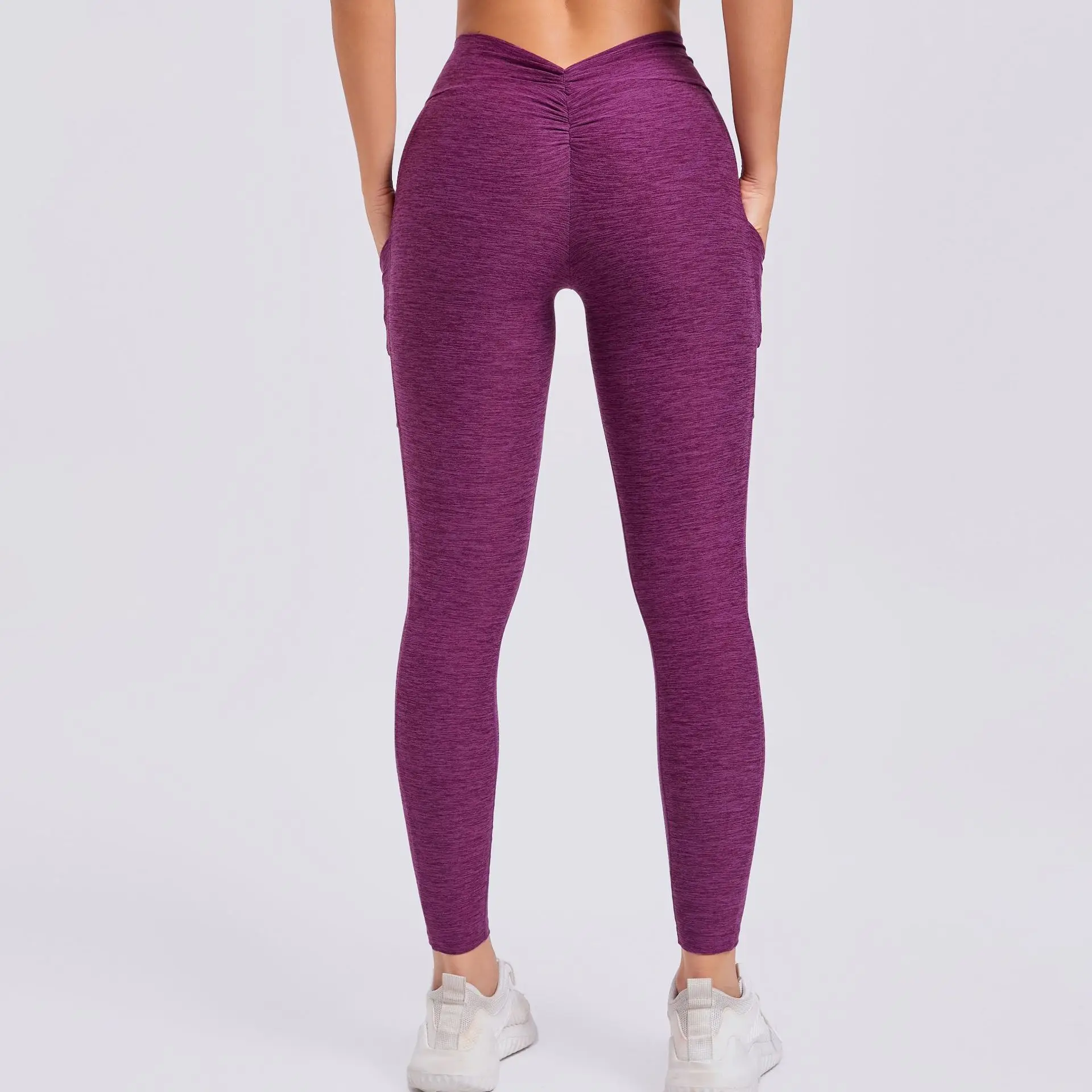 Wrinkled tight fitting side pockets V-waist yoga pants with no awkward ...