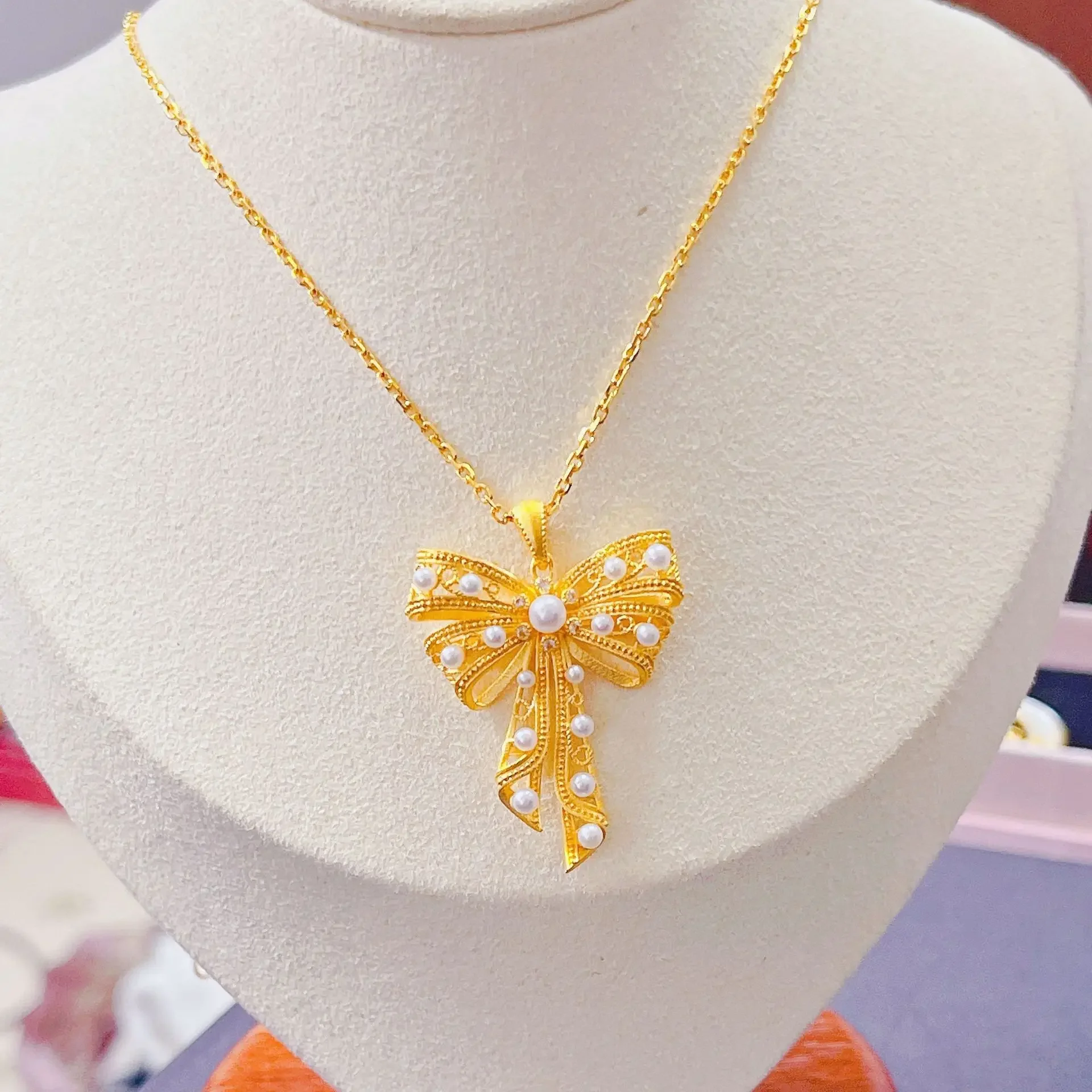 Women-s-bow-pendant-clavicle-chain-9999-real-gold-24K.jpg