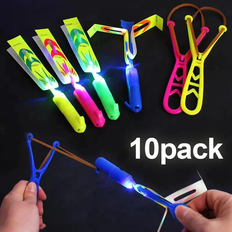 1-10pcs-Round-Whistle-Flying-Sword-Toys-LED-Blue-flash-Rubber-Slingshot ...