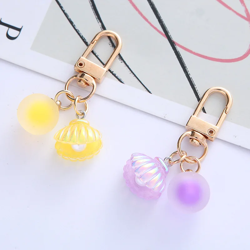 ใหม่แฟชั่นเปลือกแฟชั่น Key Chain สี Magic Ball สด Penutup Headset ...