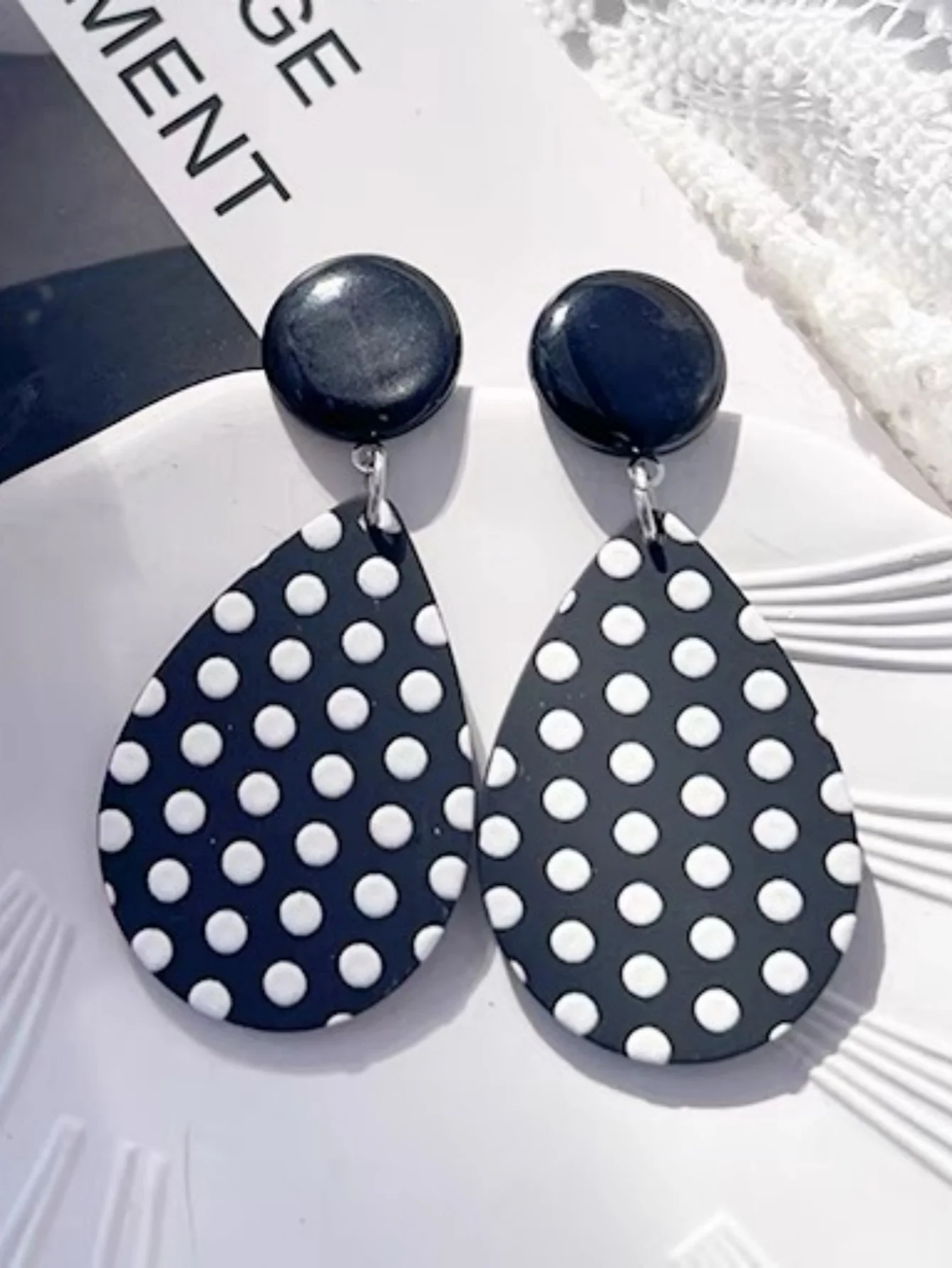 A-Pair-of-Modern-Retro-Simple-Playful-Girl-Matte-Black-and-White-Polka-Dot-Drop-Earrings.jpg