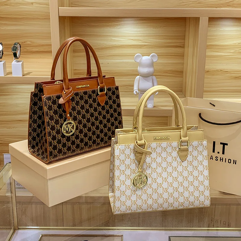 MKJ-Light-Luxury-Brand-Women-s-Bag-2023-New-Presbyopia-Small-Market-Design-with-Hanging-Parts.jpg