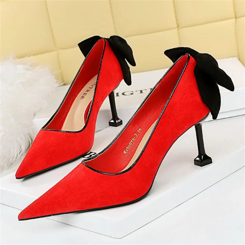 Red Heels With Black Bow