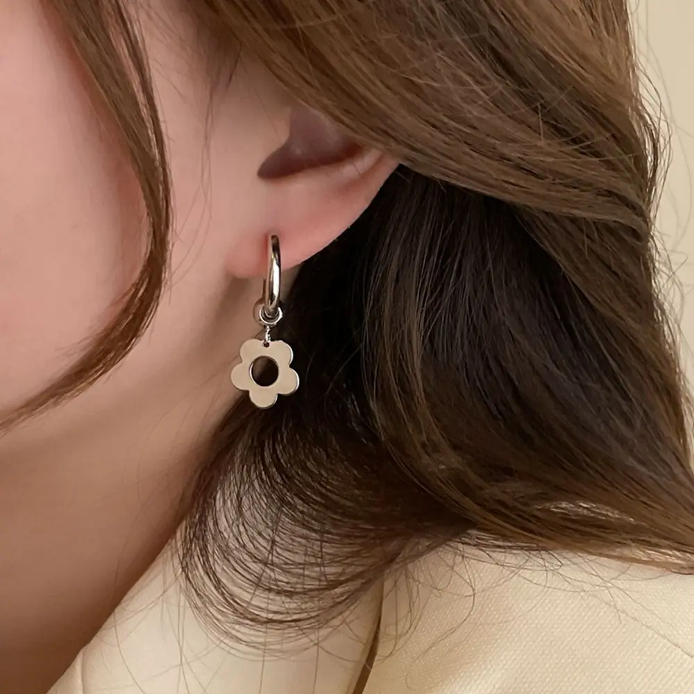 Metal texture hollow flower ear buckle earrings niche design sweet ...