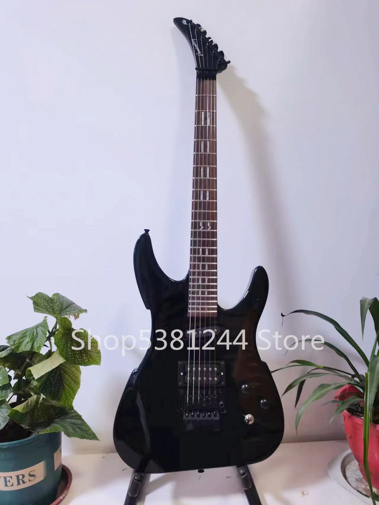 Six-string-electric-guitar-rosewood-fingerboard-black-paint-tremor ...