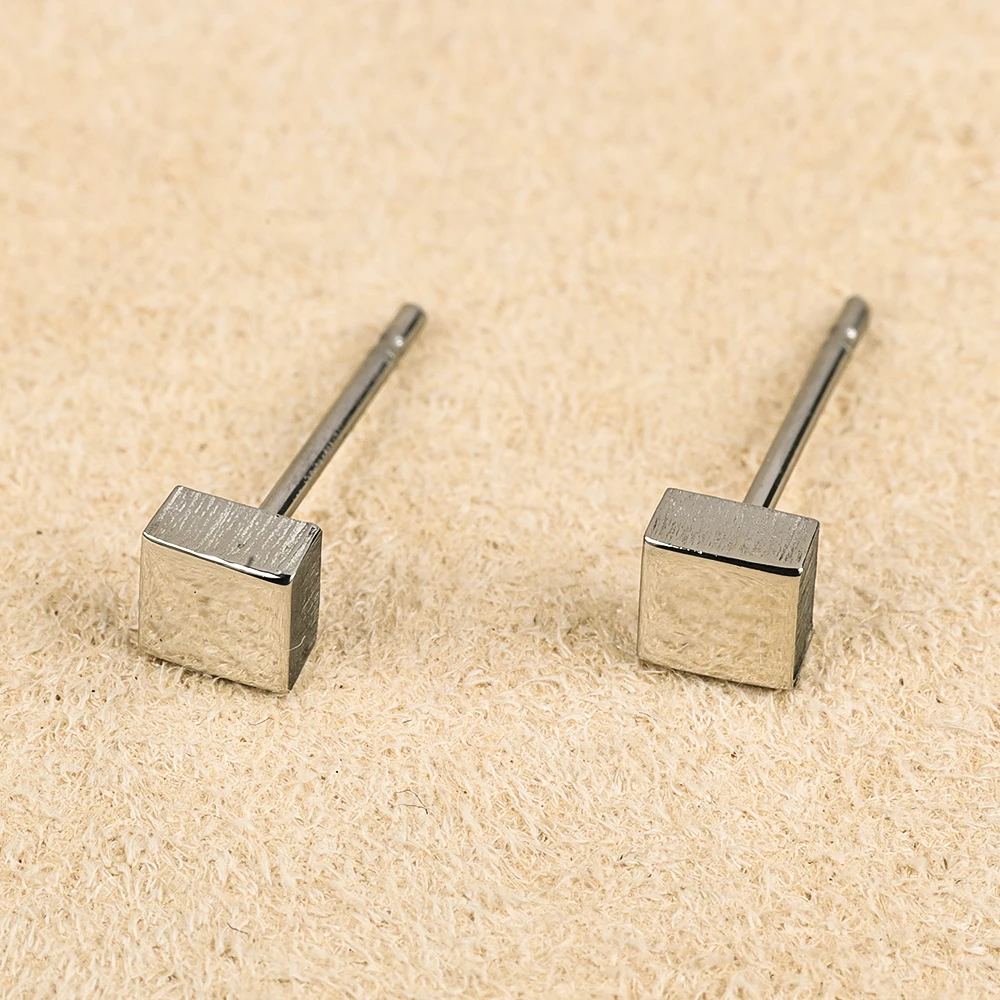 1-Pair-of-Stainless-Steel-Square-ear-Bone-Nail-Piercing-Accessories.jpg