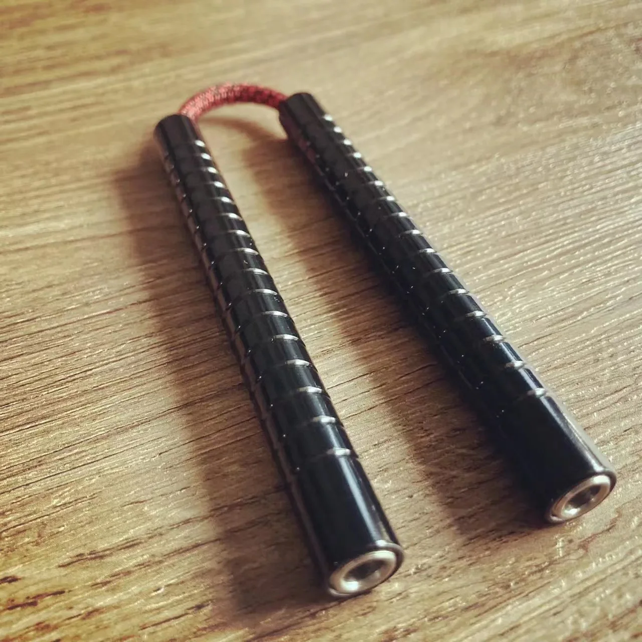 Mini Nunchaku dedo solitário brinquedo, aço inoxidável preto, brinquedo ...