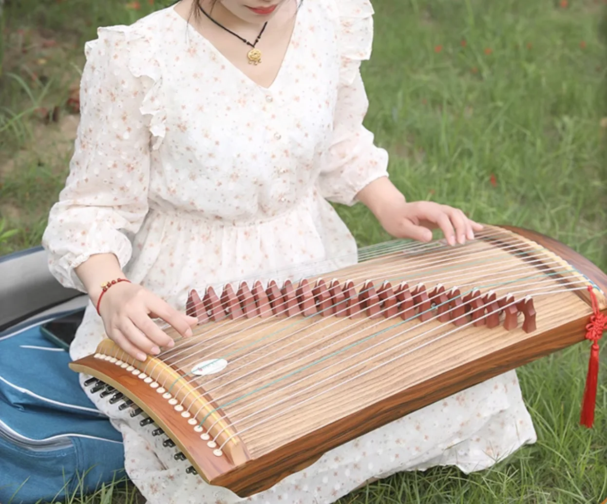 Small-Guzheng-70-cm-Chinese-string-instrument.jpg