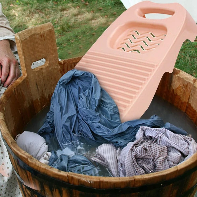 Woman Washing Clothes By Hand