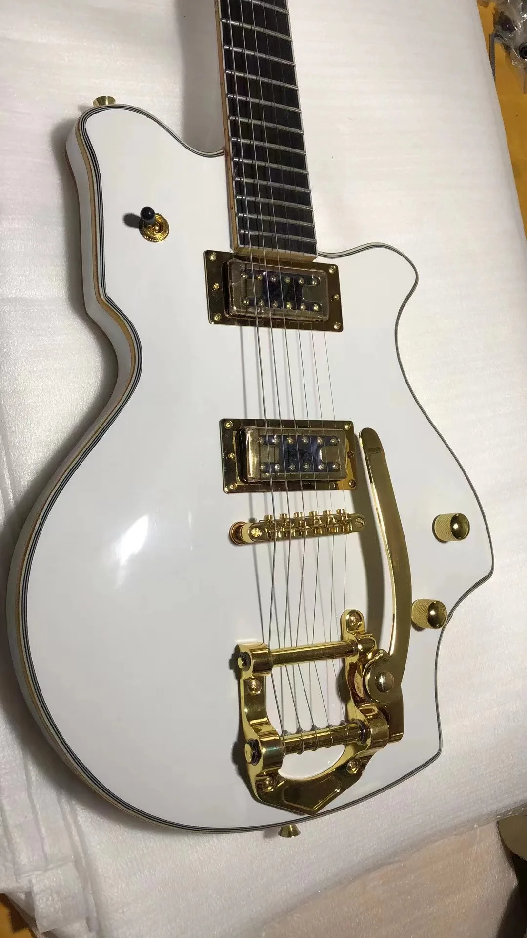 Ome-Electric-Guitar-Mahogany-Body-Finish-White-Gold-Hardware.jpg